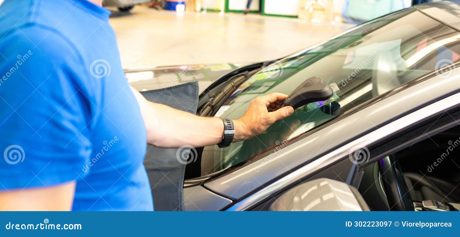 Mechanics Man Changing the Broken Windshield and Automobile Windshield ...
