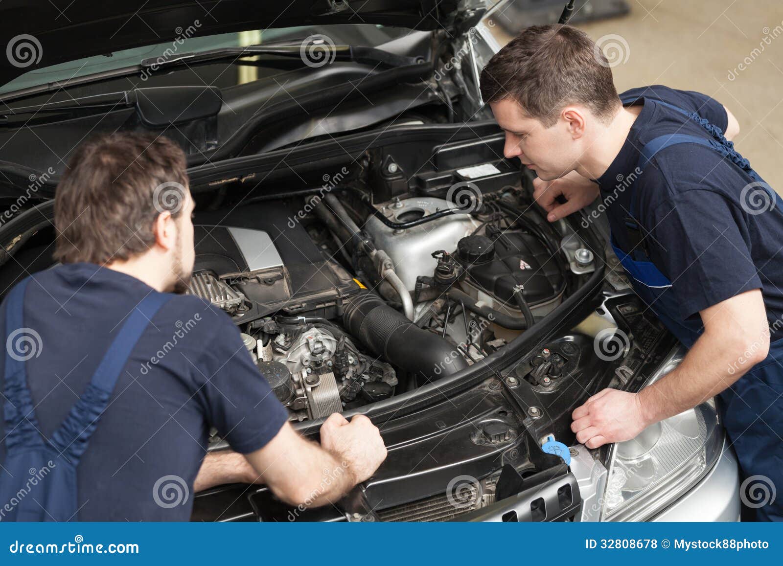 Mechanics at repair shop. stock photo. Image of technician - 32808678