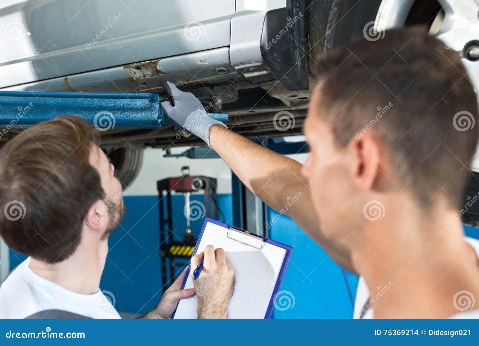 Mechanics Shows Where the Defect on the Car Stock Photo - Image of ...