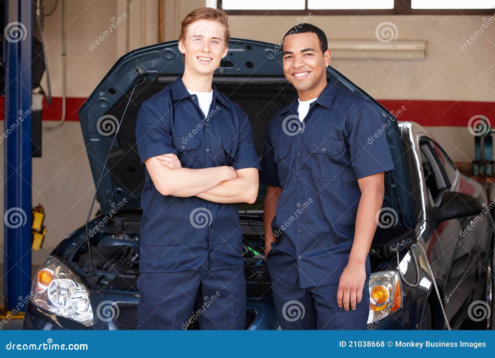 Mechanics Standing in Front of Car Stock Photo - Image of hood, camera ...