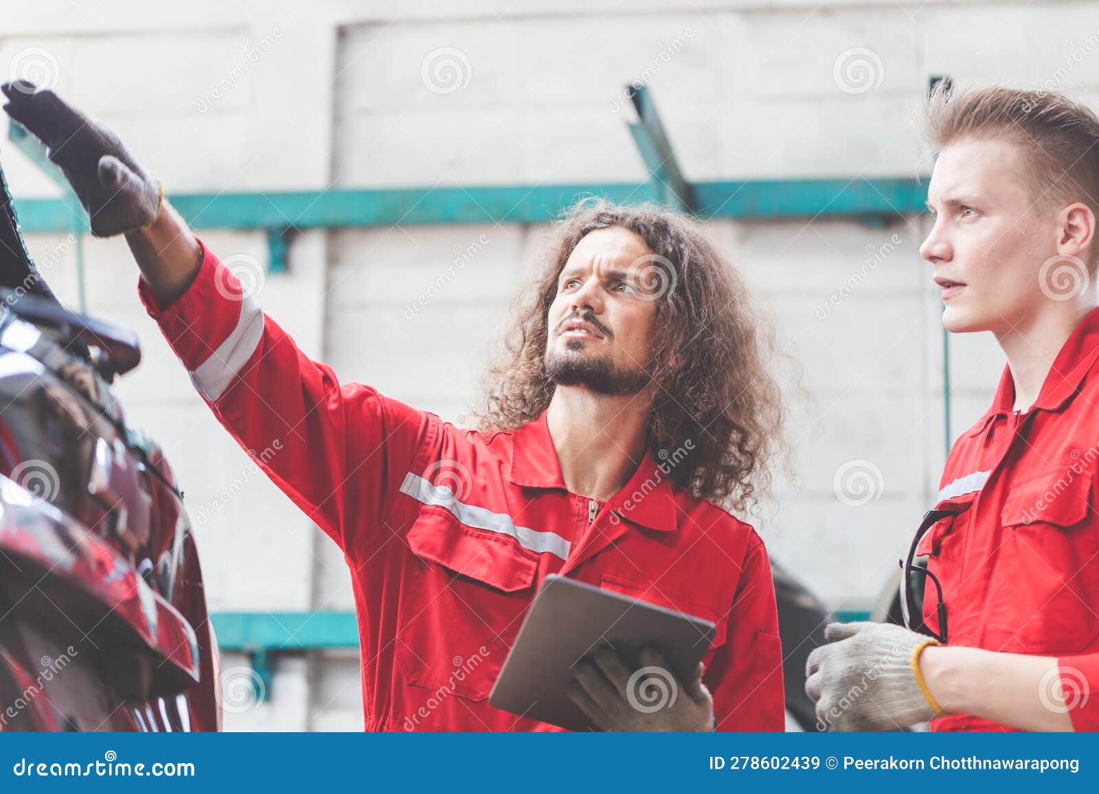Mechanics Team in Uniform are Working in Auto Service, Technician ...