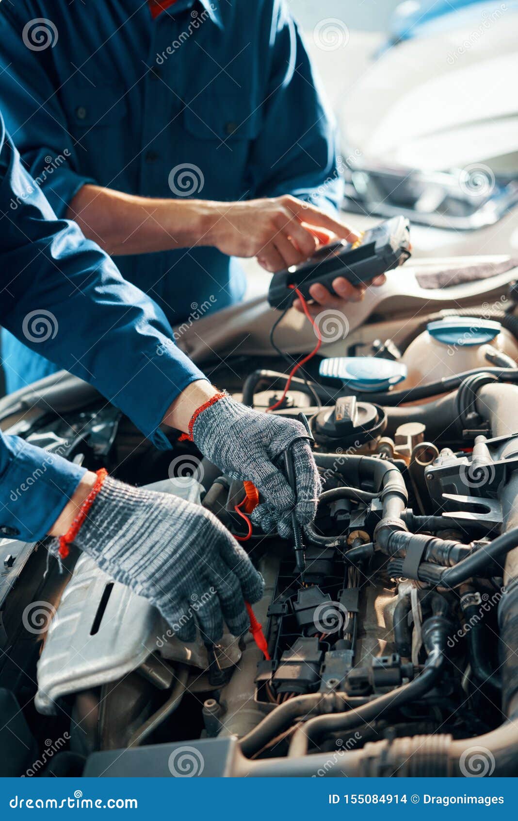Mechanics Testing Car Motor Stock Photo - Image of occupation, wrench ...