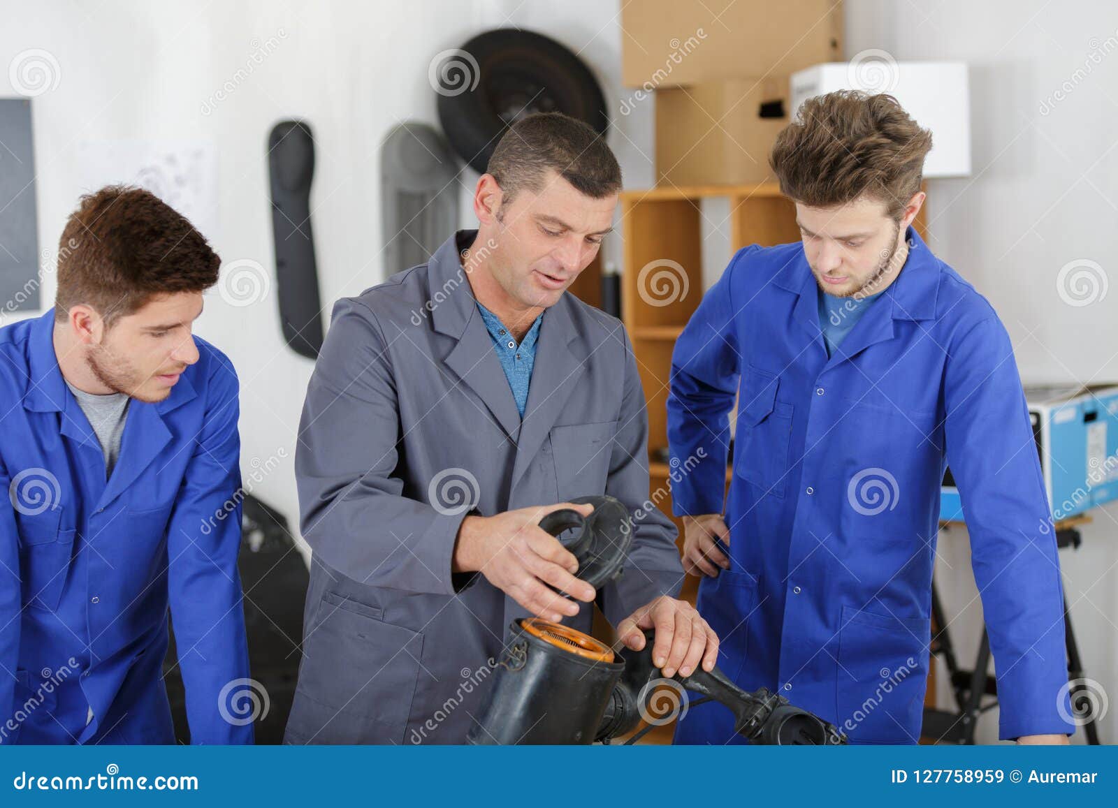 Mechanics Training Class with Teacher and Students Stock Image - Image ...