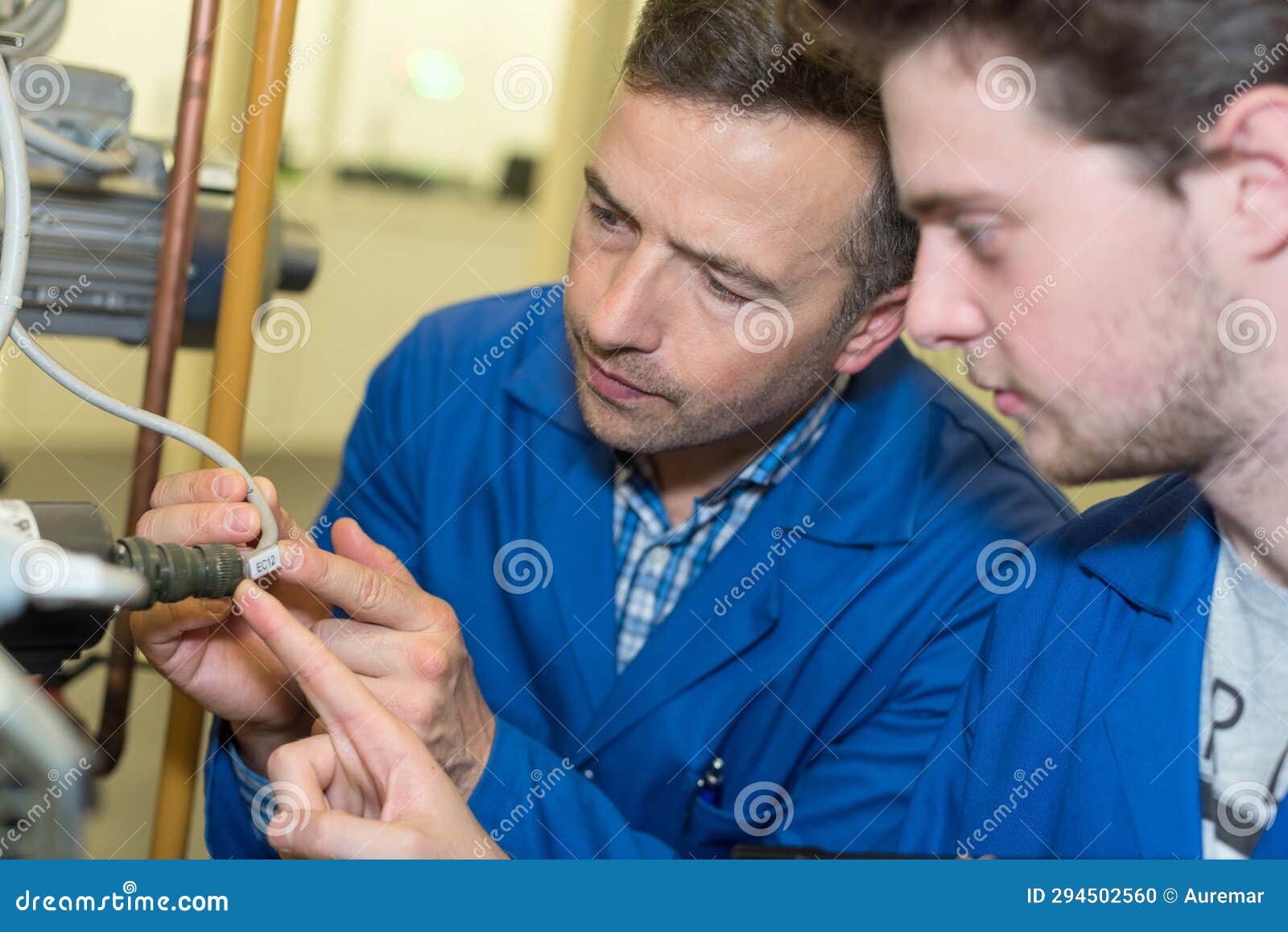 Mechanics Training Class with Teacher and Students Stock Photo - Image ...