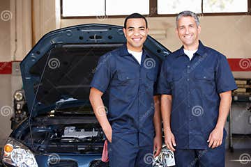 Mechanics at work stock image. Image of overalls, indoors - 21038291