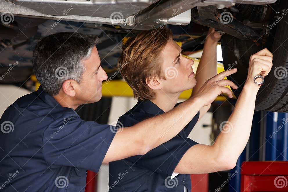 Mechanics at work stock image. Image of portrait, employed - 21040943