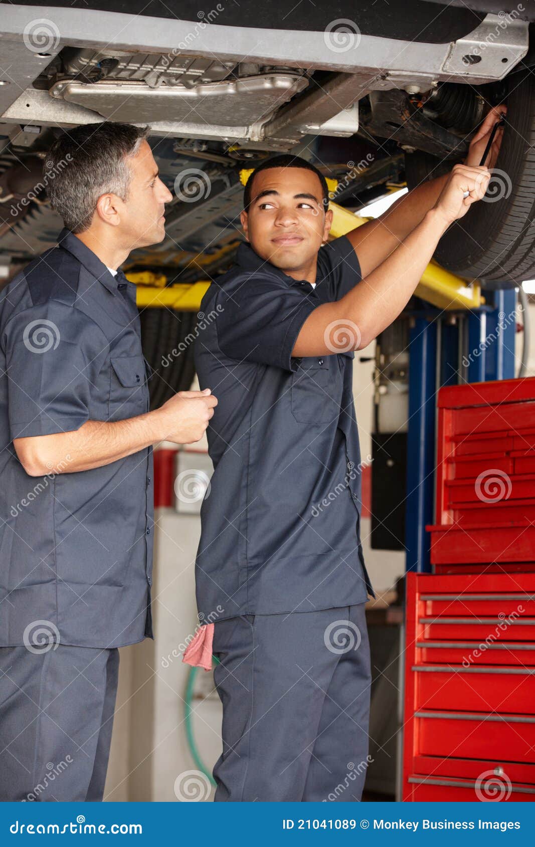 Mechanics at work stock image. Image of bonnet, adult - 21041089
