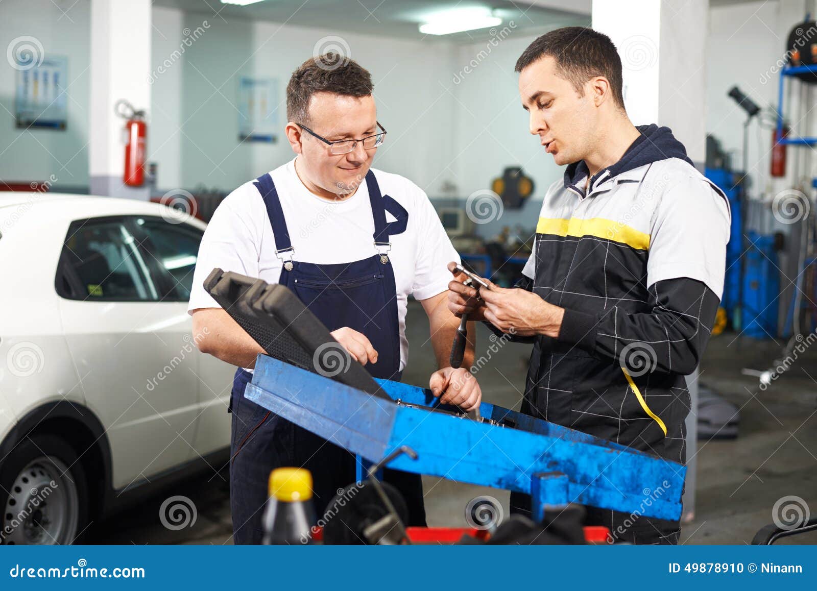 Mechanics at work shop stock photo. Image of indoors - 49878910