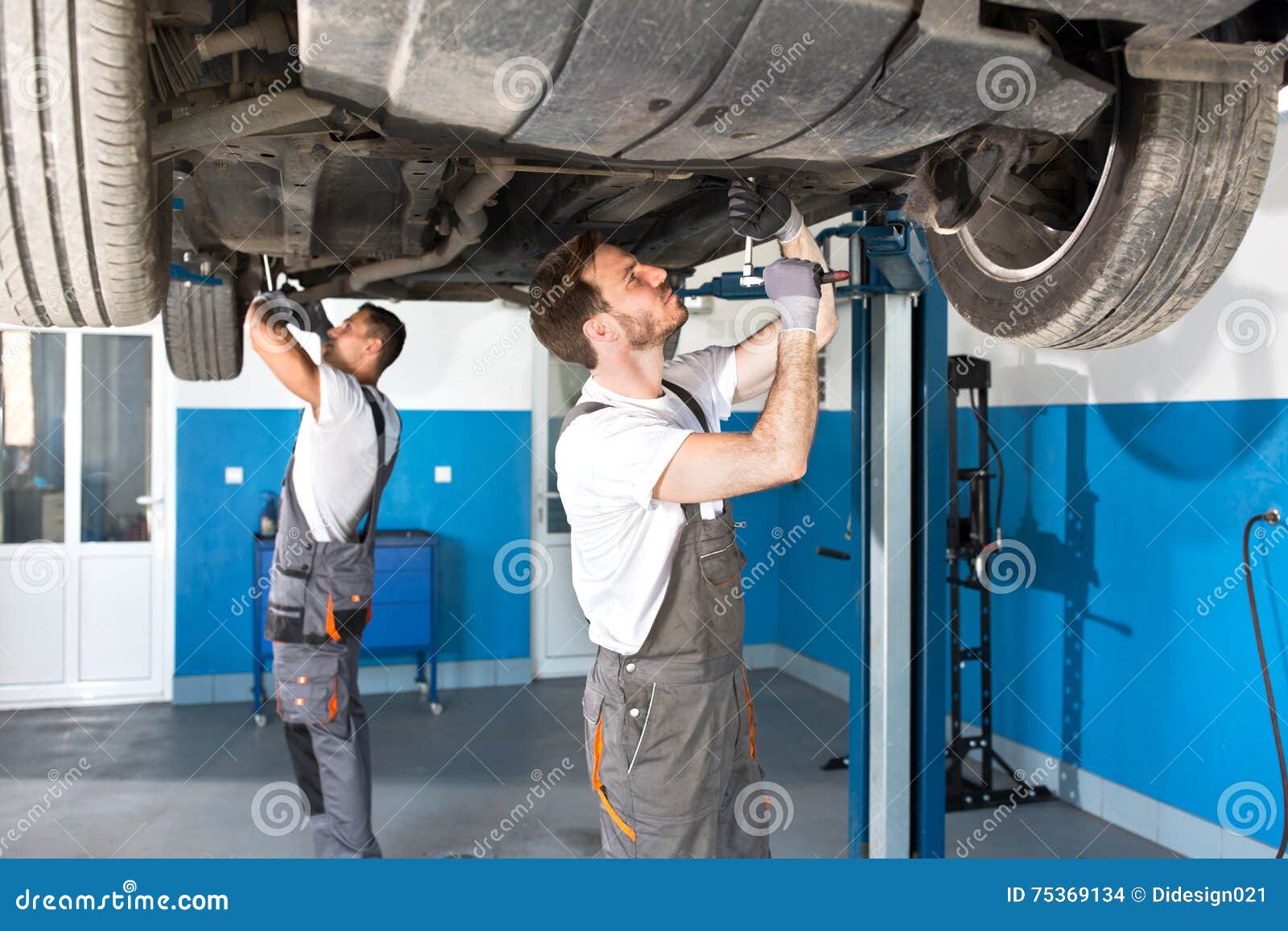 Mechanics Working Together, Teamwork Repair Car Stock Photo - Image of ...