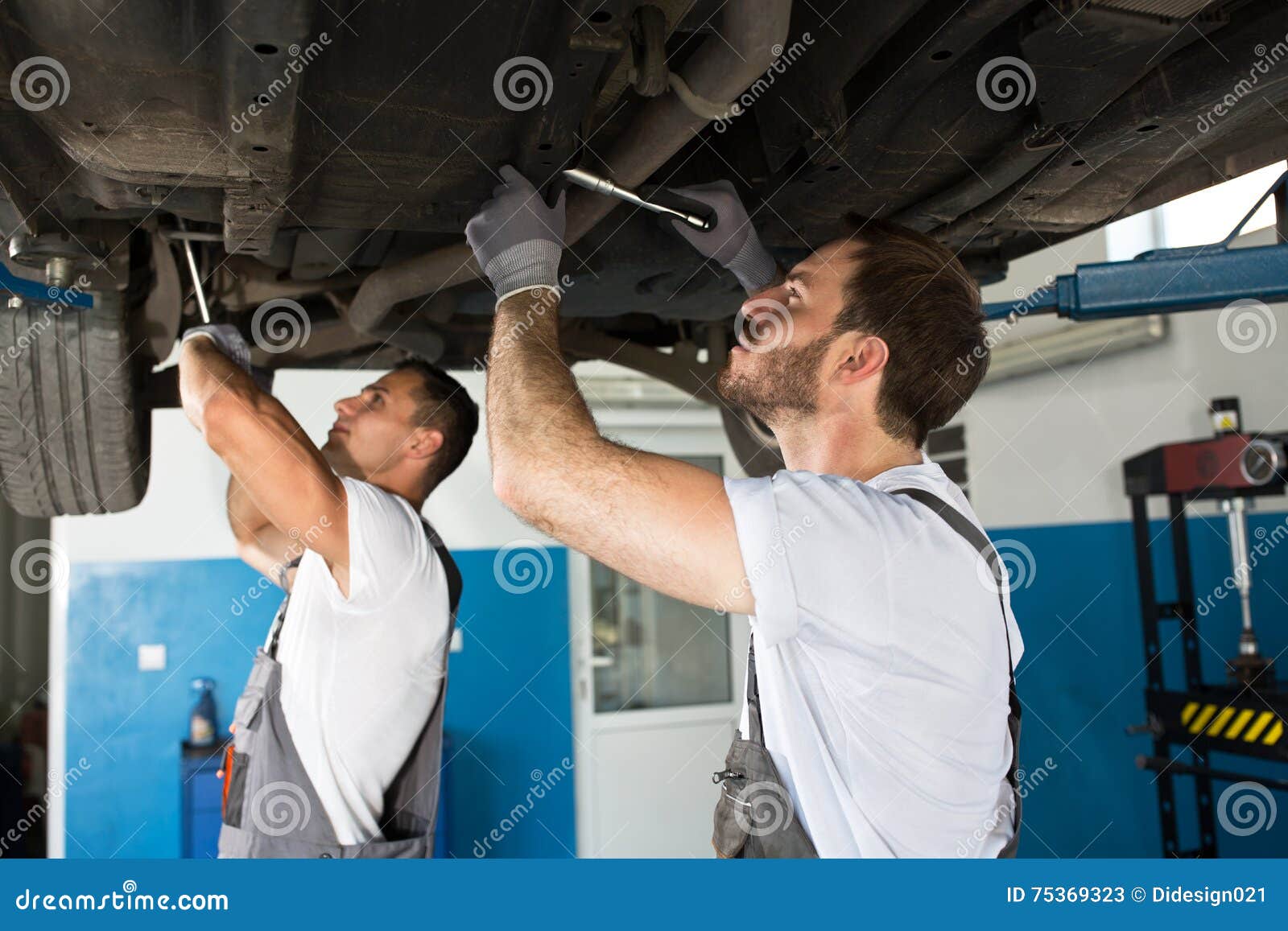 Mechanics Working Under the Car Stock Image - Image of professional ...