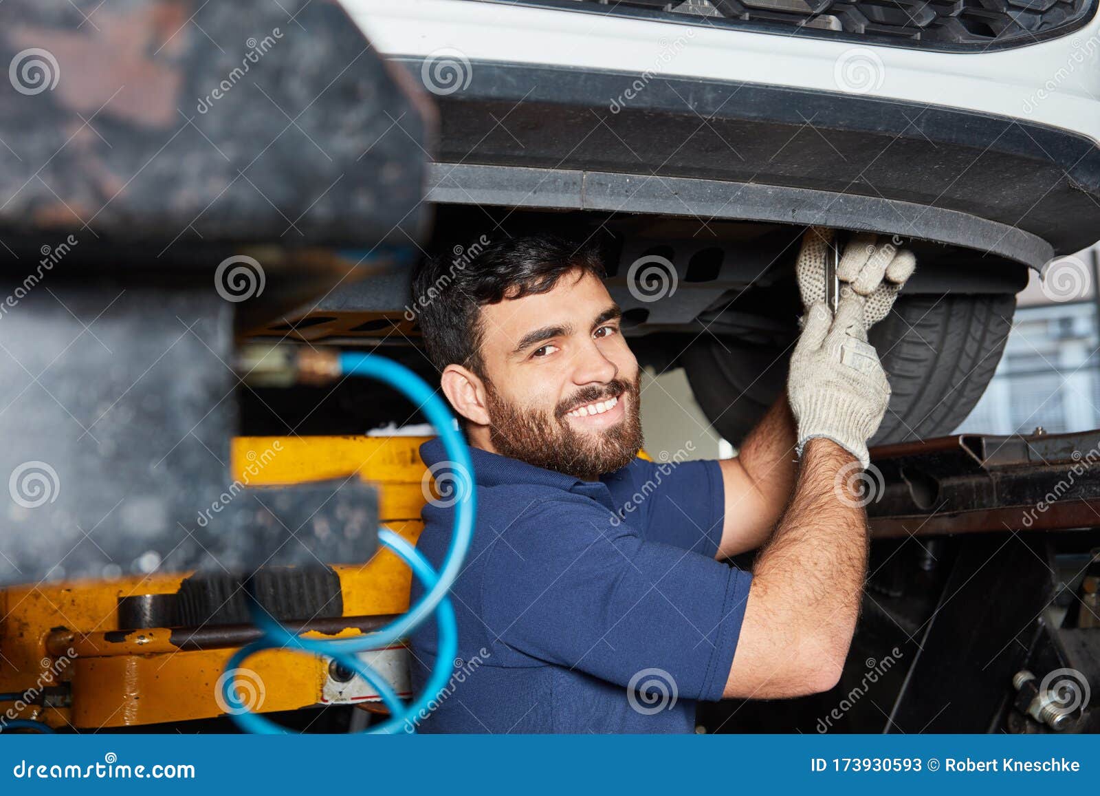 Mechatronics Apprentice at the Auto Repair Stock Image - Image of ramp ...