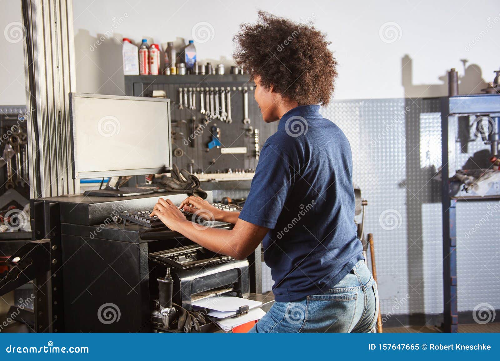 Mechatronics Apprentice at the Computer in the Workshop Stock Image ...