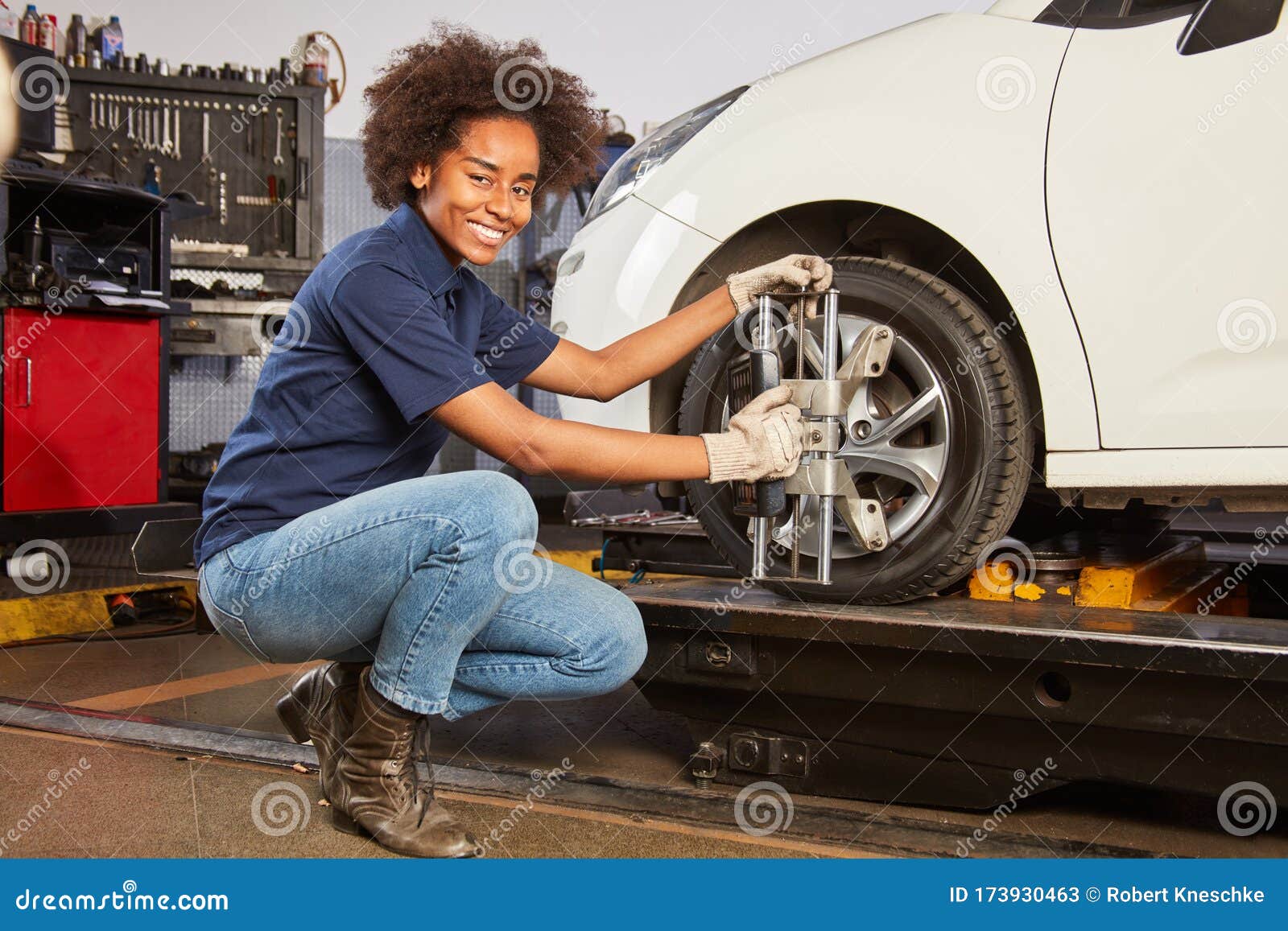 Mechatronics Apprentice Does a Wheel Alignment Stock Image - Image of ...