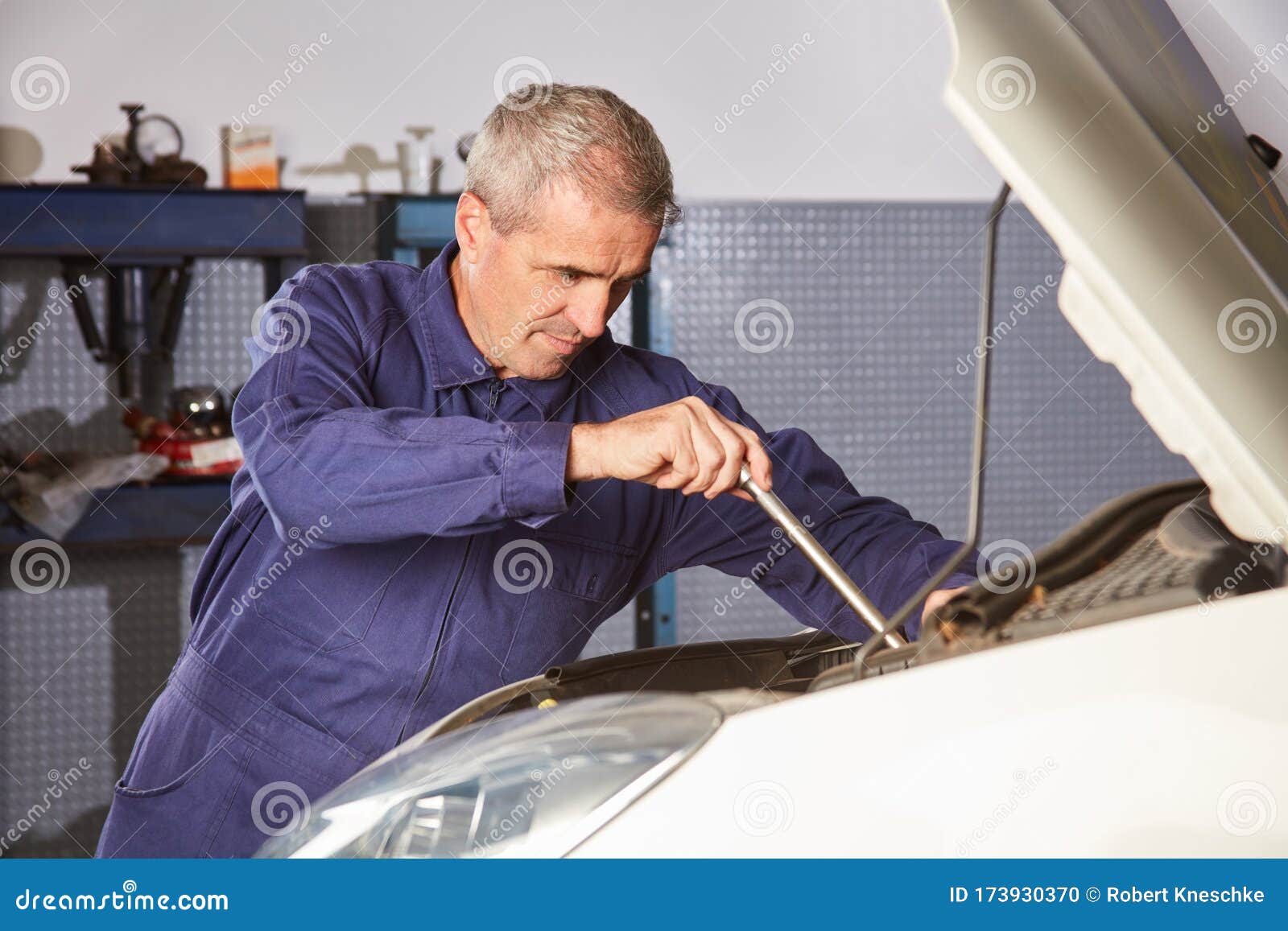 Mechatronics Engineer at the Repair of the Car Engine Stock Photo ...
