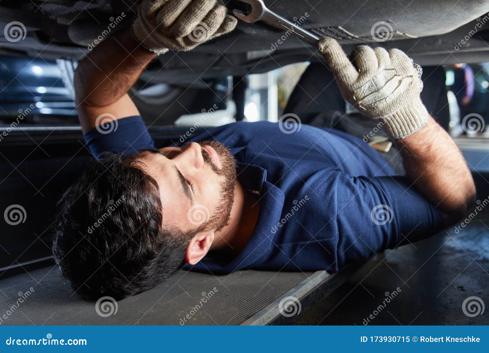 Mechatronics Engineer is Repairing Under the Car Stock Image - Image of ...