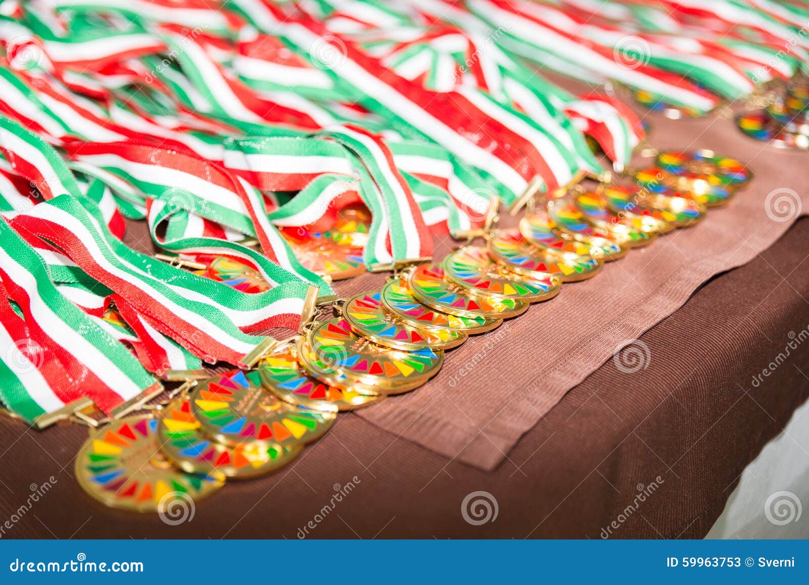 Medals on the table editorial stock photo. Image of gold - 59963753