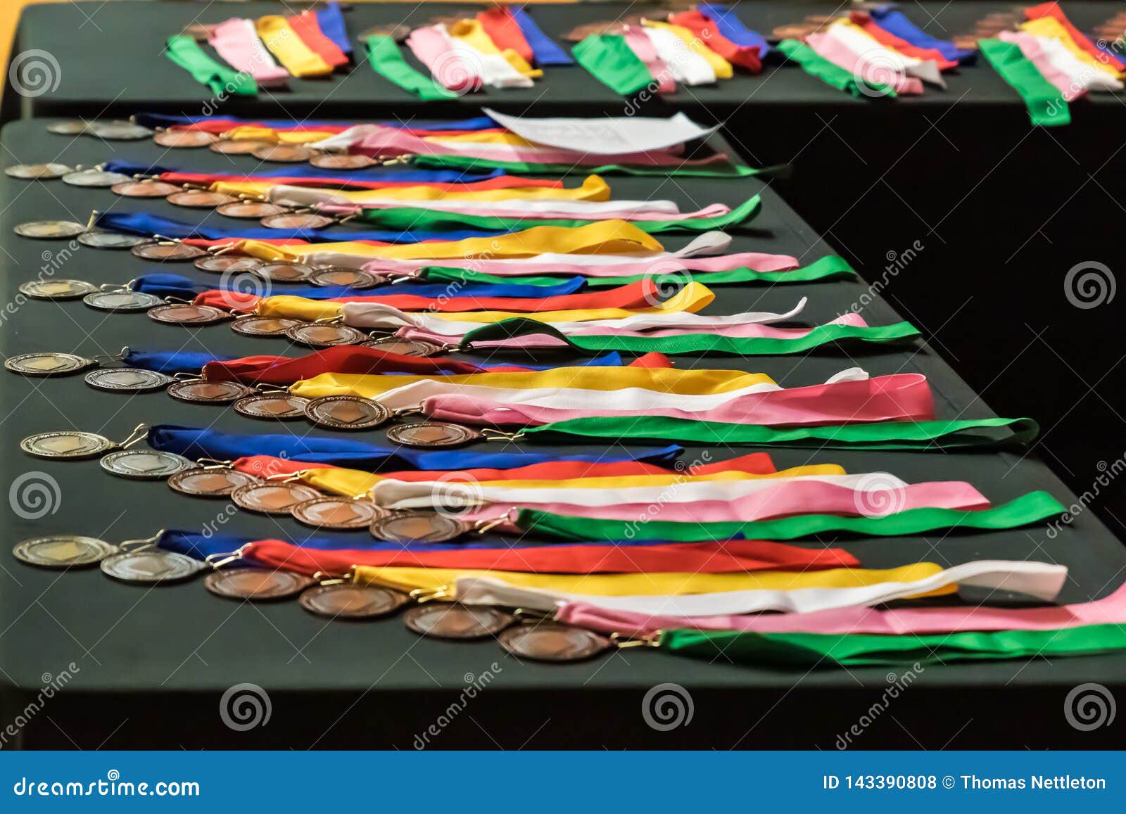 Medals on a table stock photo. Image of gold, ceremony - 143390808