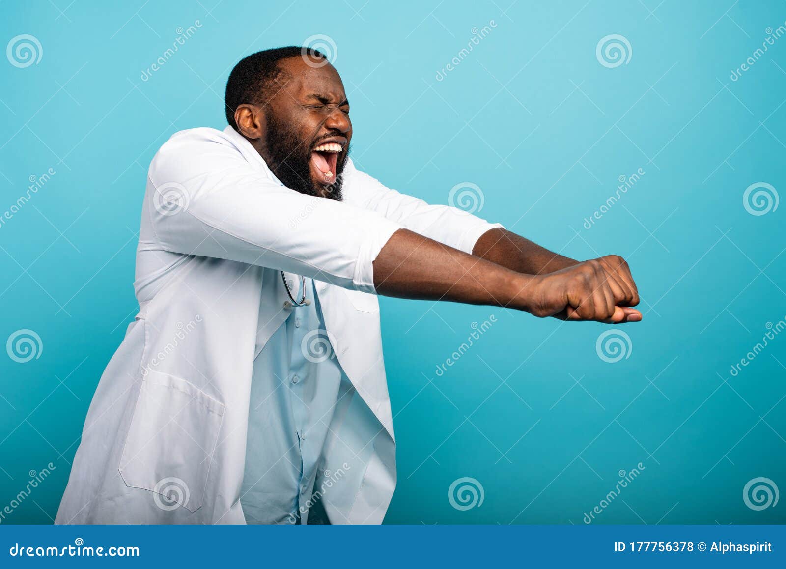 Medic is Happy and Dances. Joyful Expression. Blue Background Stock ...