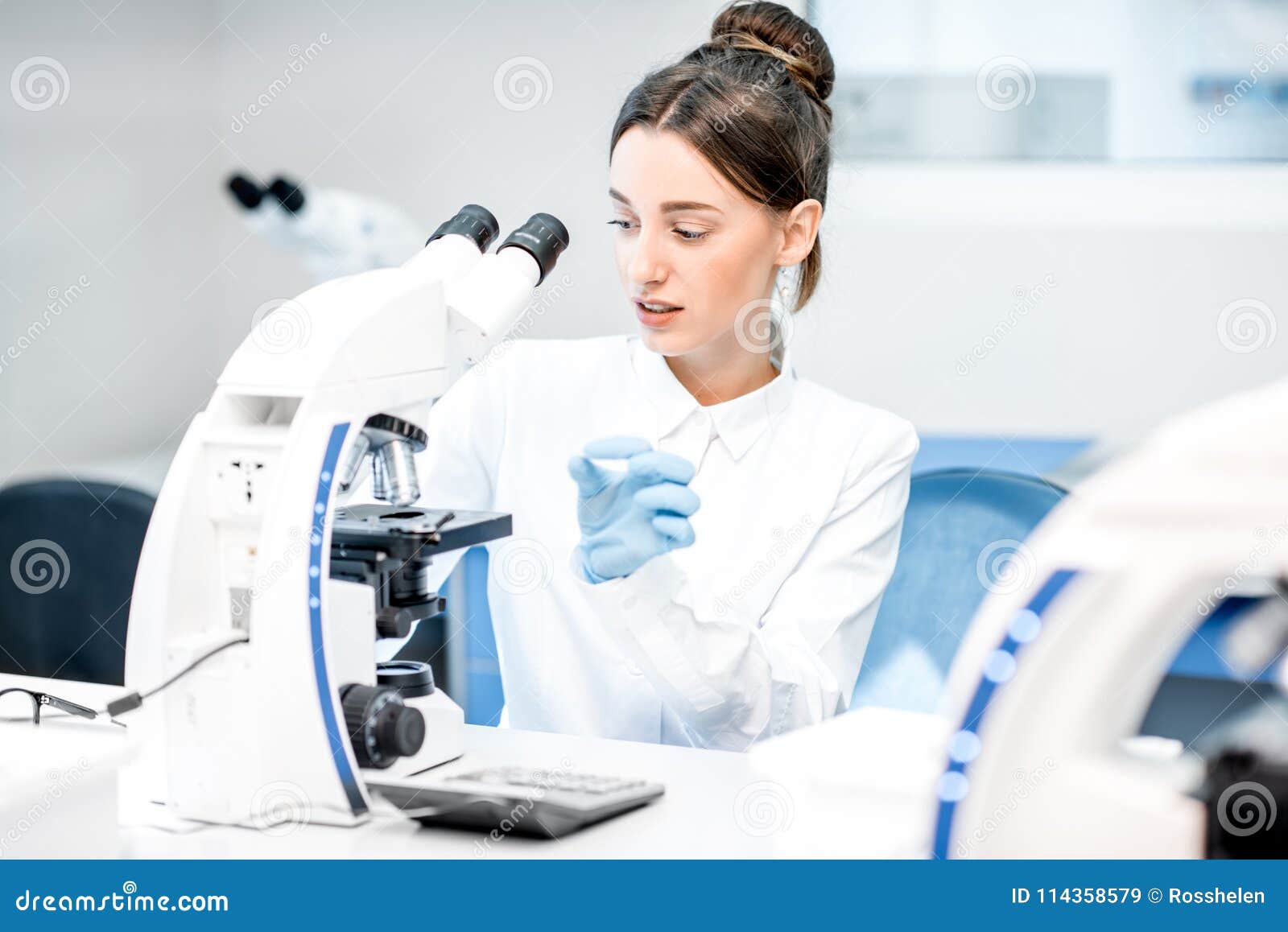 Medic Working with Microscope at the Laboratory Stock Image - Image of ...