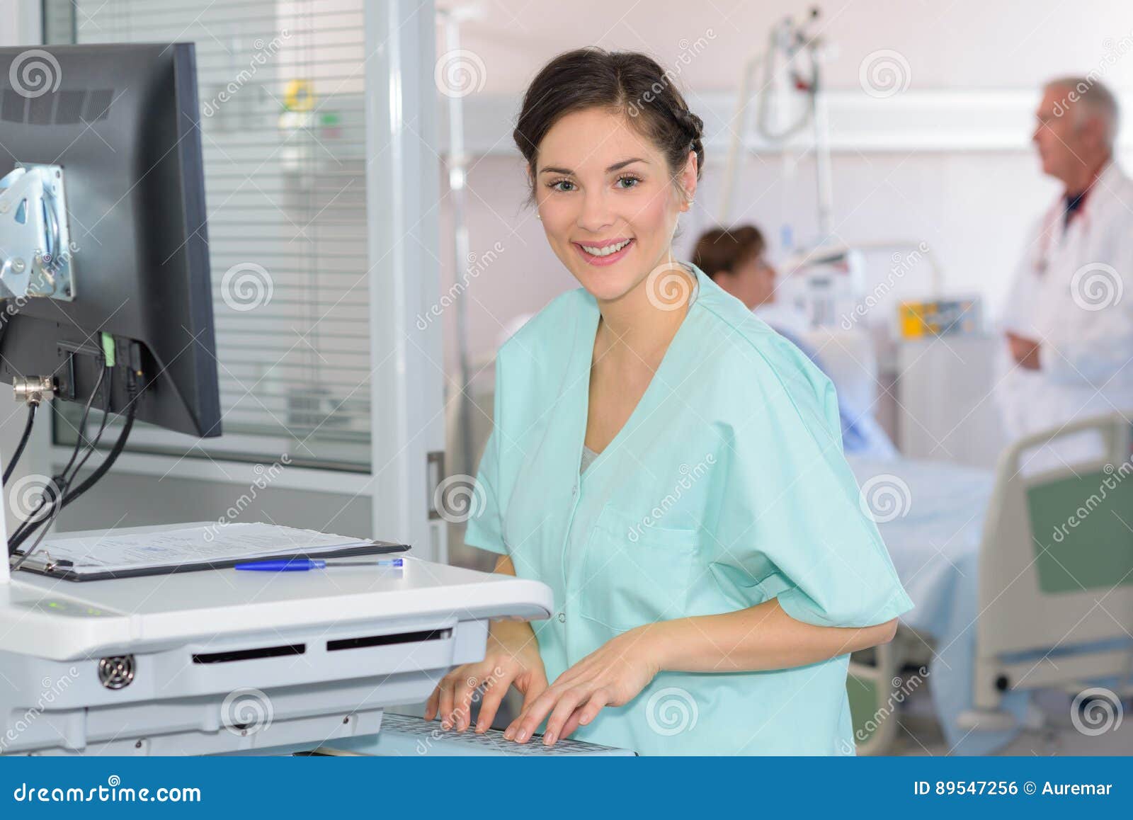 Medical Assistant Typing in Computer Stock Photo - Image of discharge ...