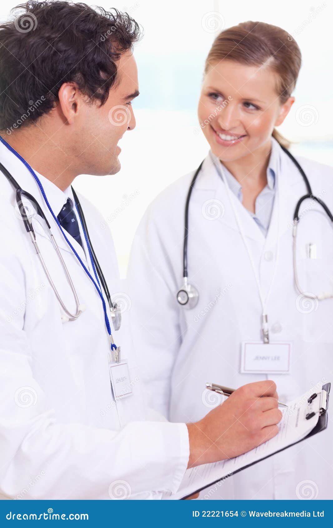 Medical Assistants with Patient Record Stock Photo - Image of 2529 ...