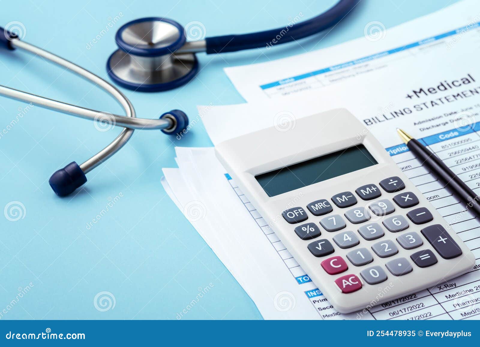 Medical Bill Concept with Calculator and Stethoscope on Blue Background ...