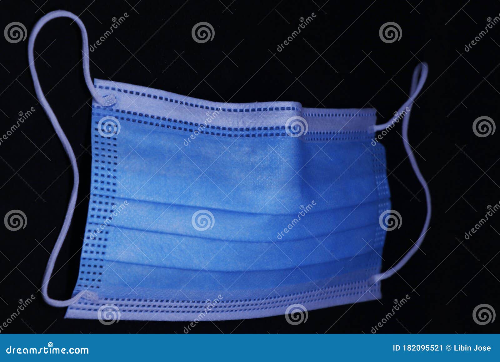 Medical Blue Face Mask Isolated with Black Background Stock Image ...