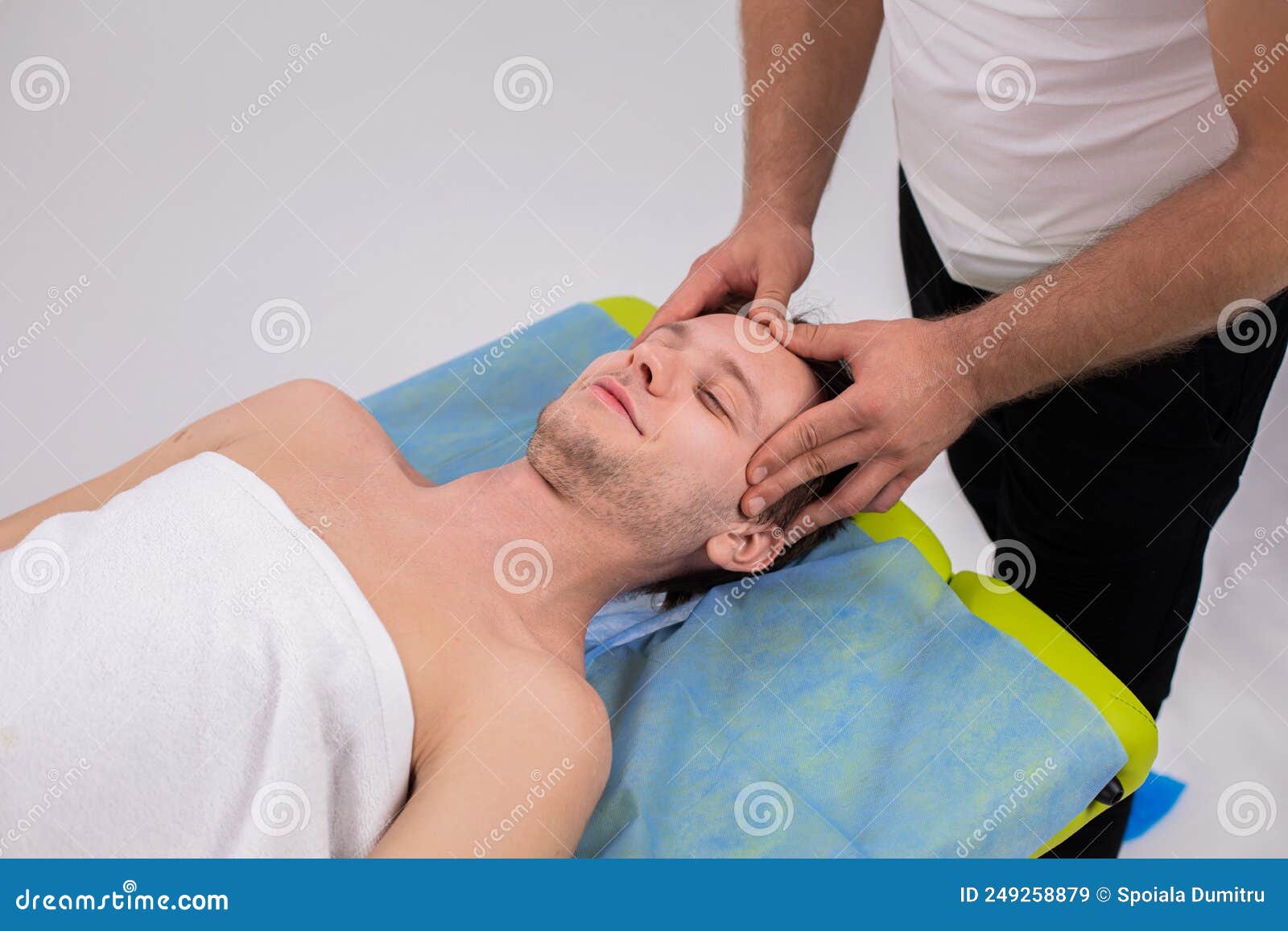 At Medical Clinic Professional Masseur Man Very Handsome Doing A Head