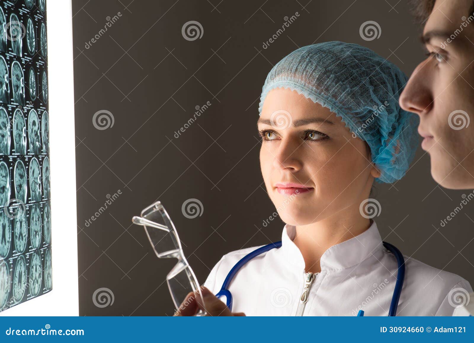 Medical Colleagues Confer Near the X-ray Image Stock Photo - Image of ...