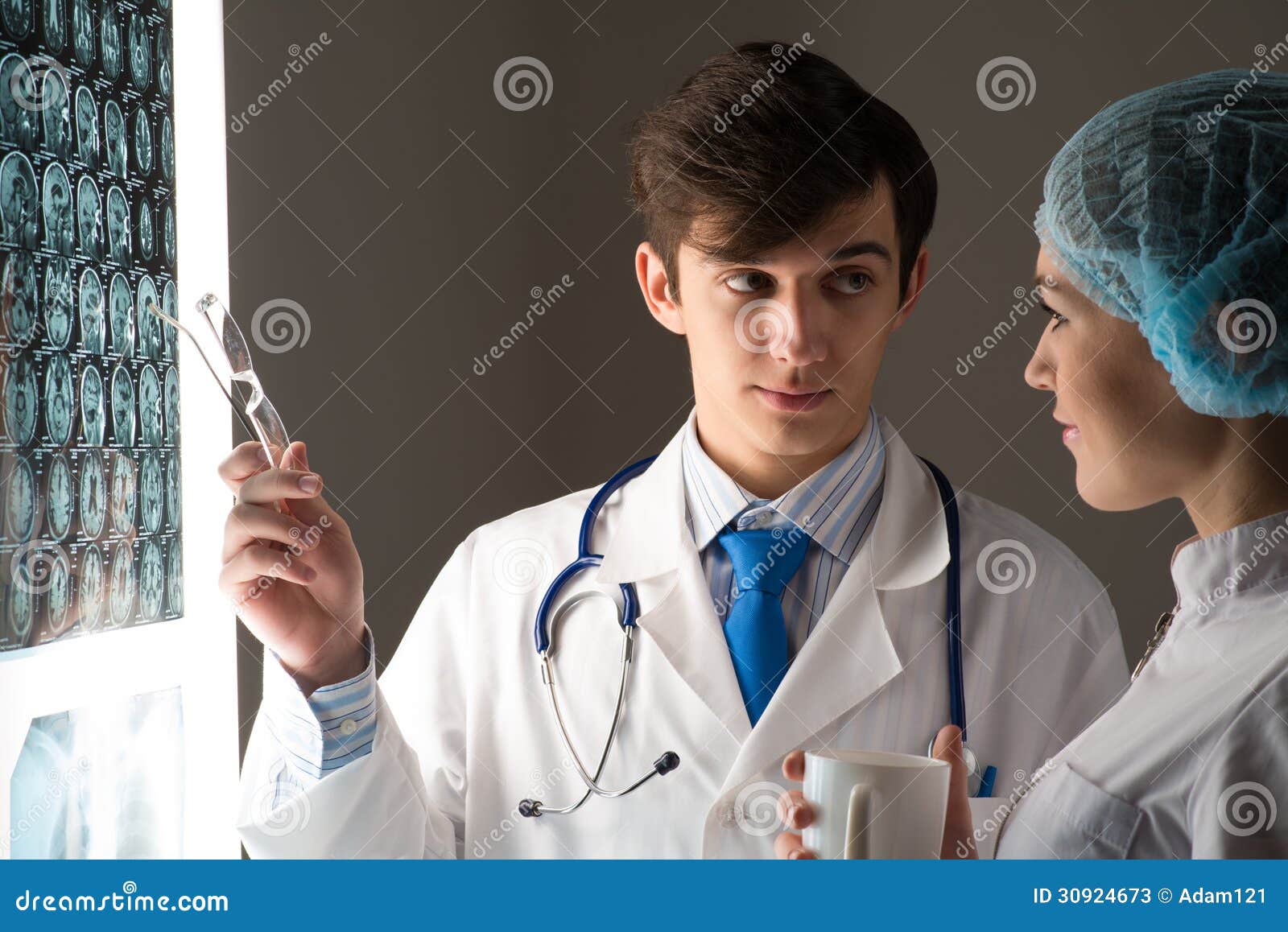 Medical Colleagues Confer Near the X-ray Image Stock Image - Image of ...