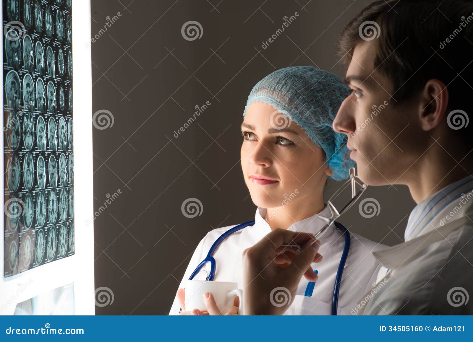 Medical Colleagues Confer Near the X-ray Image Stock Photo - Image of ...