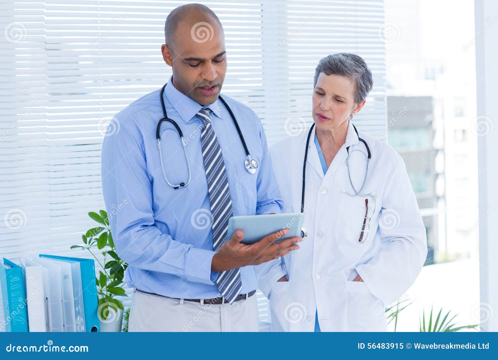 Medical Colleagues Working with Tablet Computer Stock Image - Image of ...