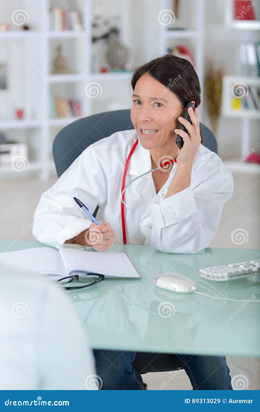 Medical doctor with phone stock image. Image of work - 89313029