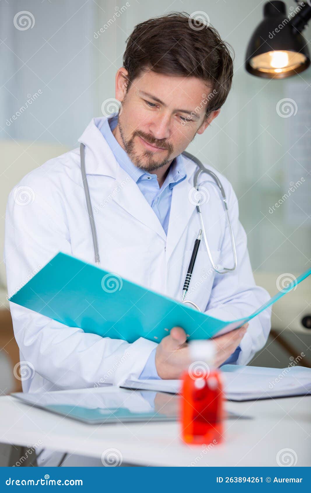 Medical Doctor Reading Report Document at Office Stock Image - Image of ...