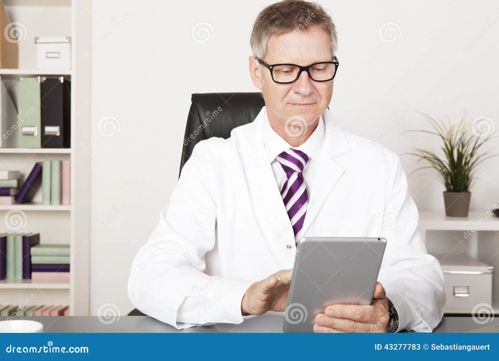 Medical Doctor Reading Reports Using Tablet Stock Image - Image of ...