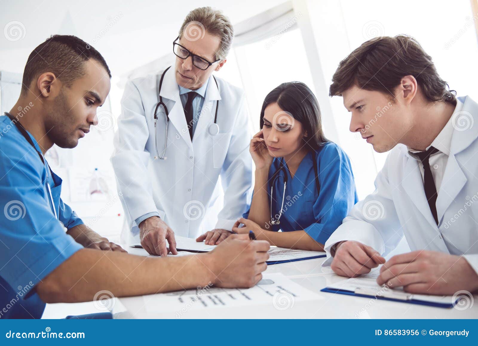 Medical Doctors at the Conference Stock Photo - Image of male, female ... Medical Doctors at the Conference Stock Photo - Image of male, female ...