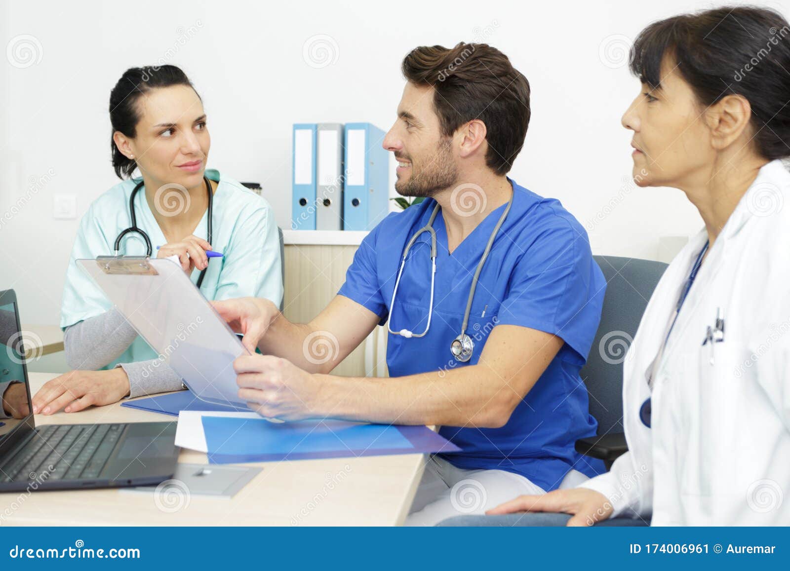 Medical Doctors Discussing Case Stock Image - Image of adult, hospital ...