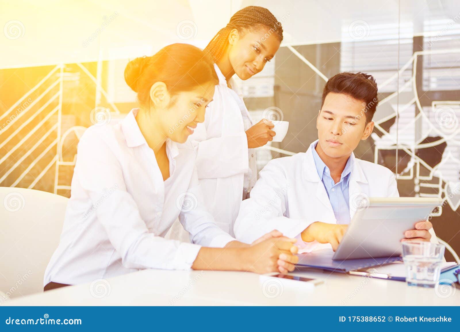 Medical Doctors Studying with Tablet Computer Stock Photo - Image of ...