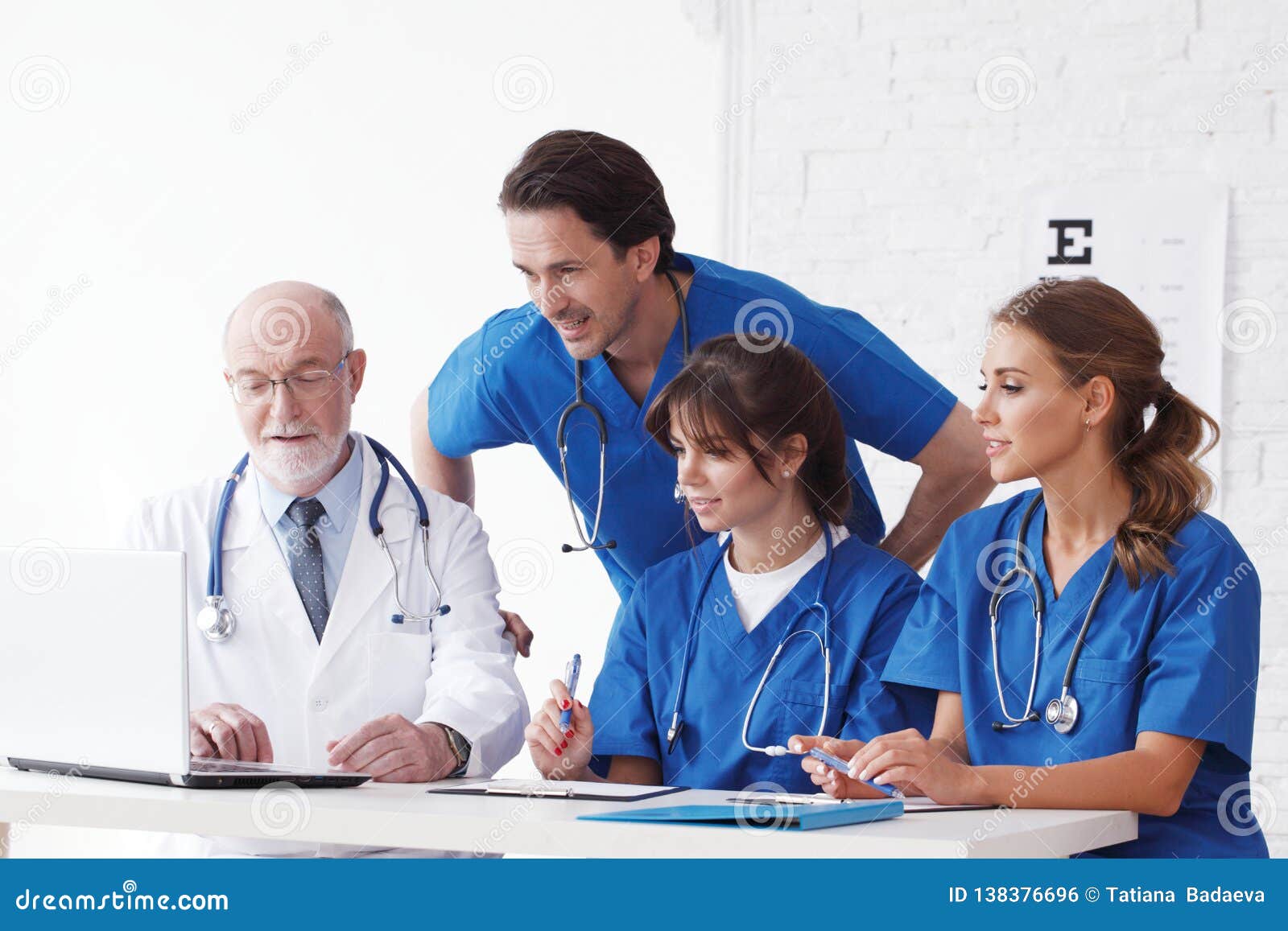 Medical Doctors Team Using Computer Stock Photo - Image of looking ...