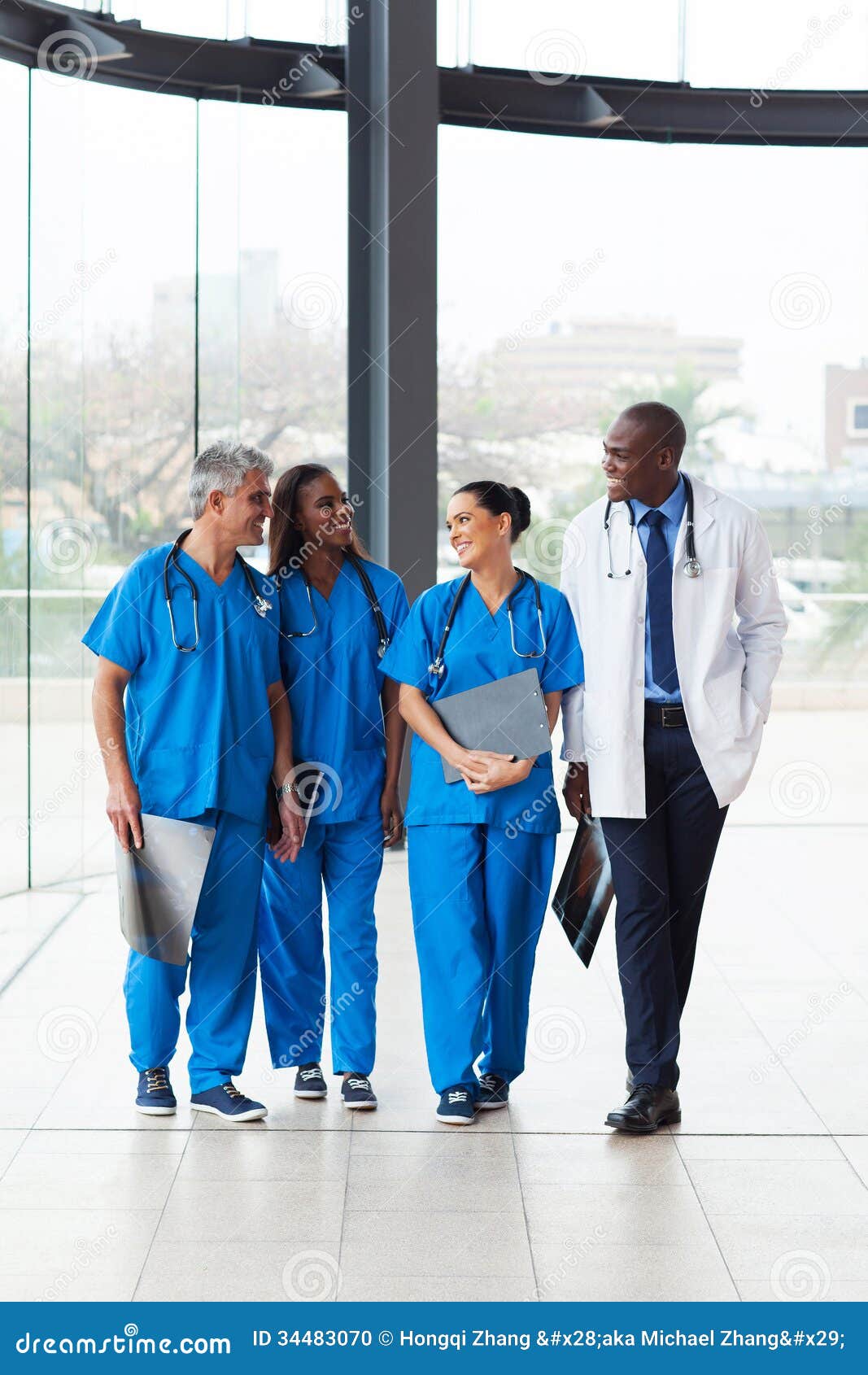 Medical doctors walking stock photo. Image of attractive - 34483070