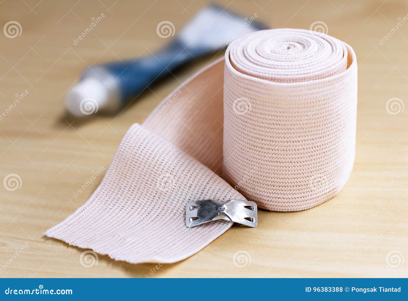 Medical Elastic Bandage on Wood Table. Stock Photo - Image of wrap ...