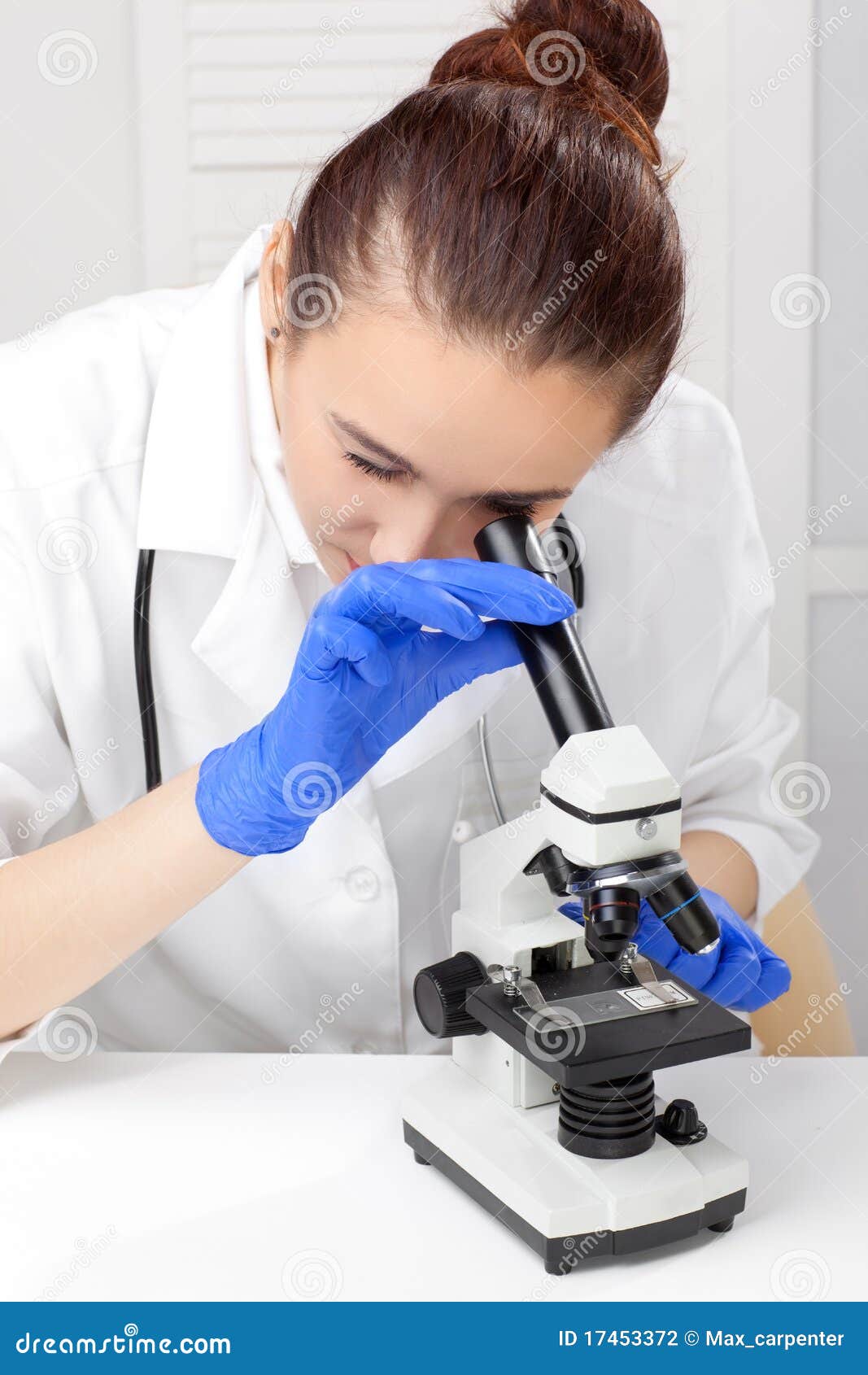 Medical - Female Nurse Looking in Microscope Stock Photo - Image of ...