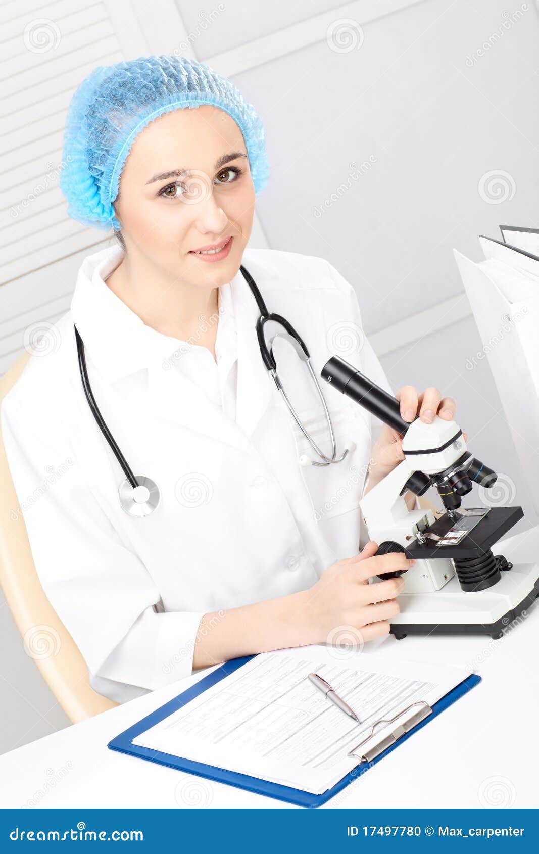 Medical - Female Nurse Looking in Microscope Stock Photo - Image of ...