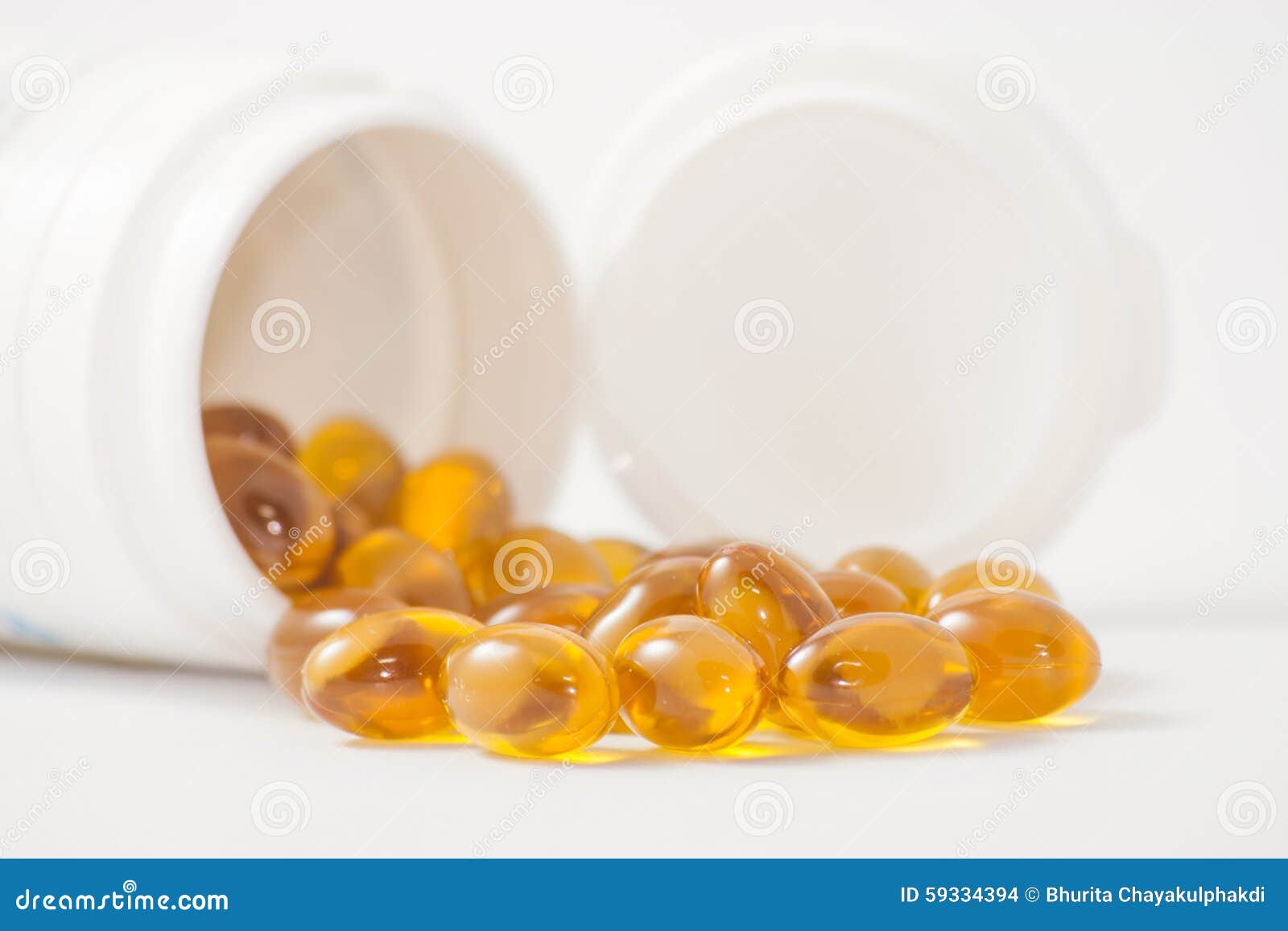Medical gold capsule stock photo. Image of background - 59334394