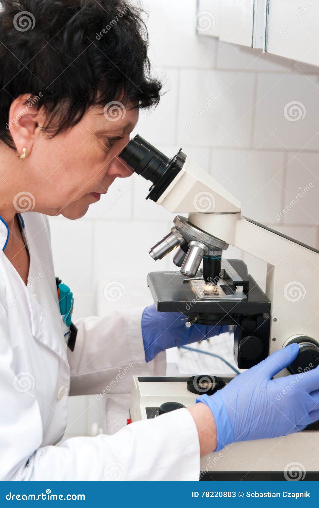 Medical Laboratory Worker with Microscope Stock Image - Image of ...