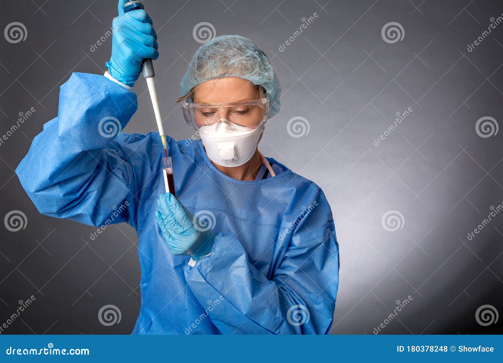 Medical Laboratory Worker Using a Pipette To Sample Blood Test for ...
