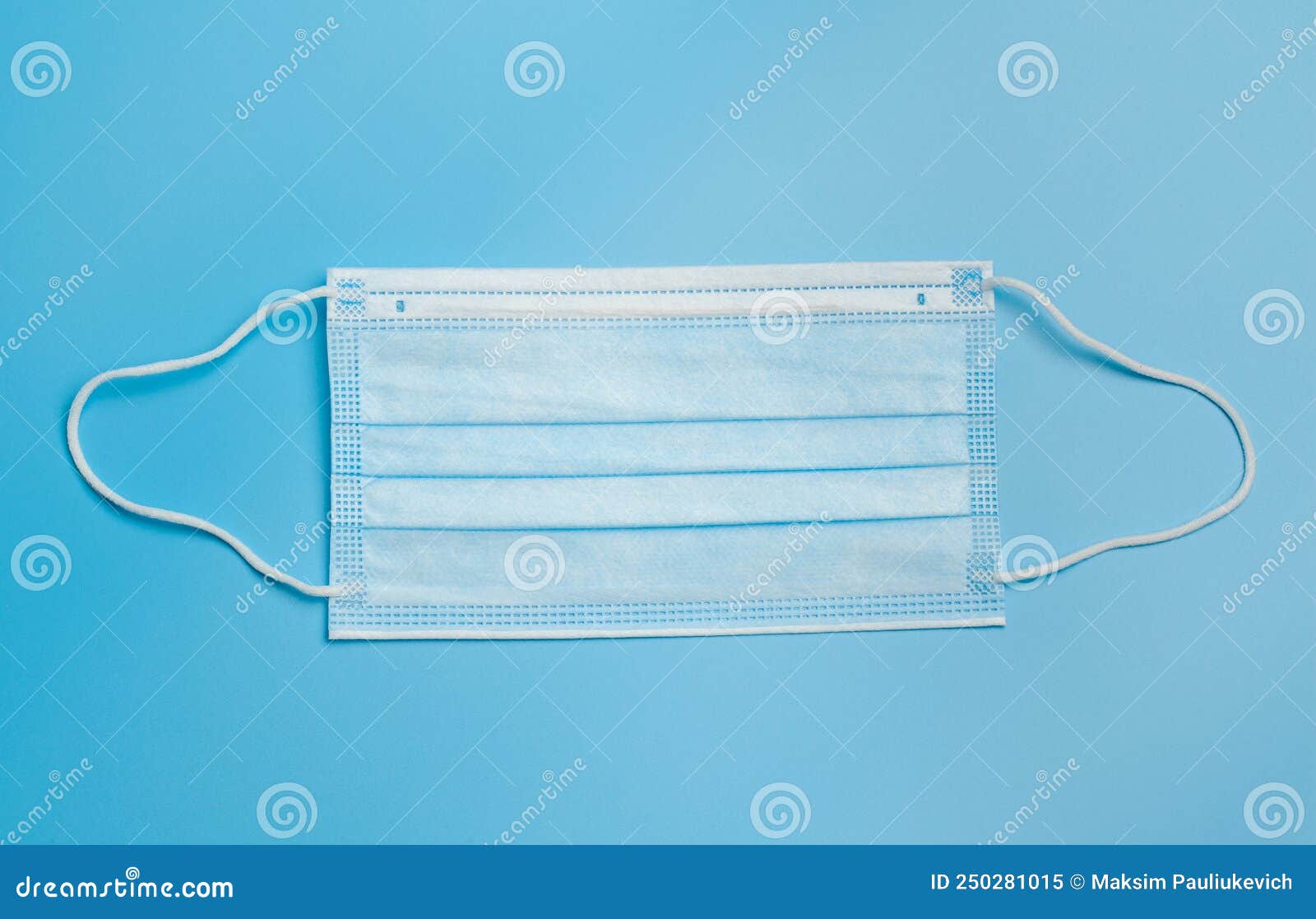 Medical Mask. Blue Medical Mask with a White Elastic Band Stock Image ...