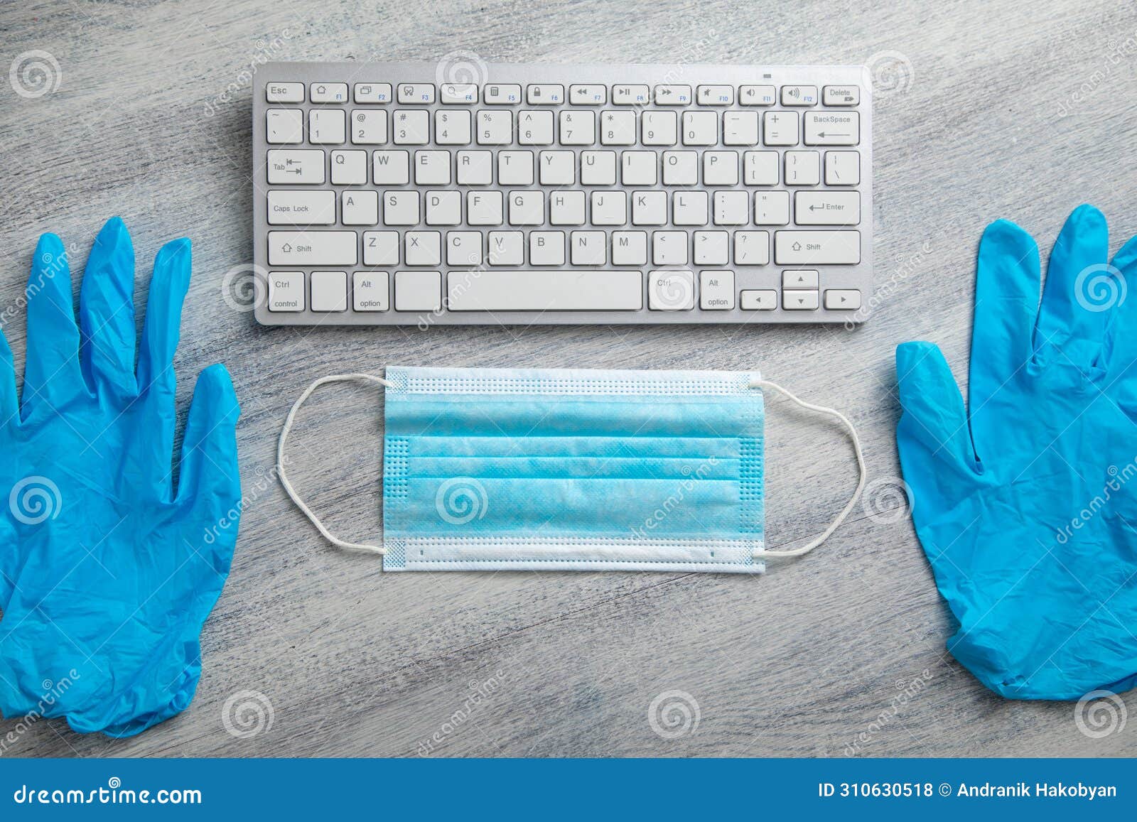 Medical Mask, Gloves and Computer Keyboard on the Table Stock Photo ...
