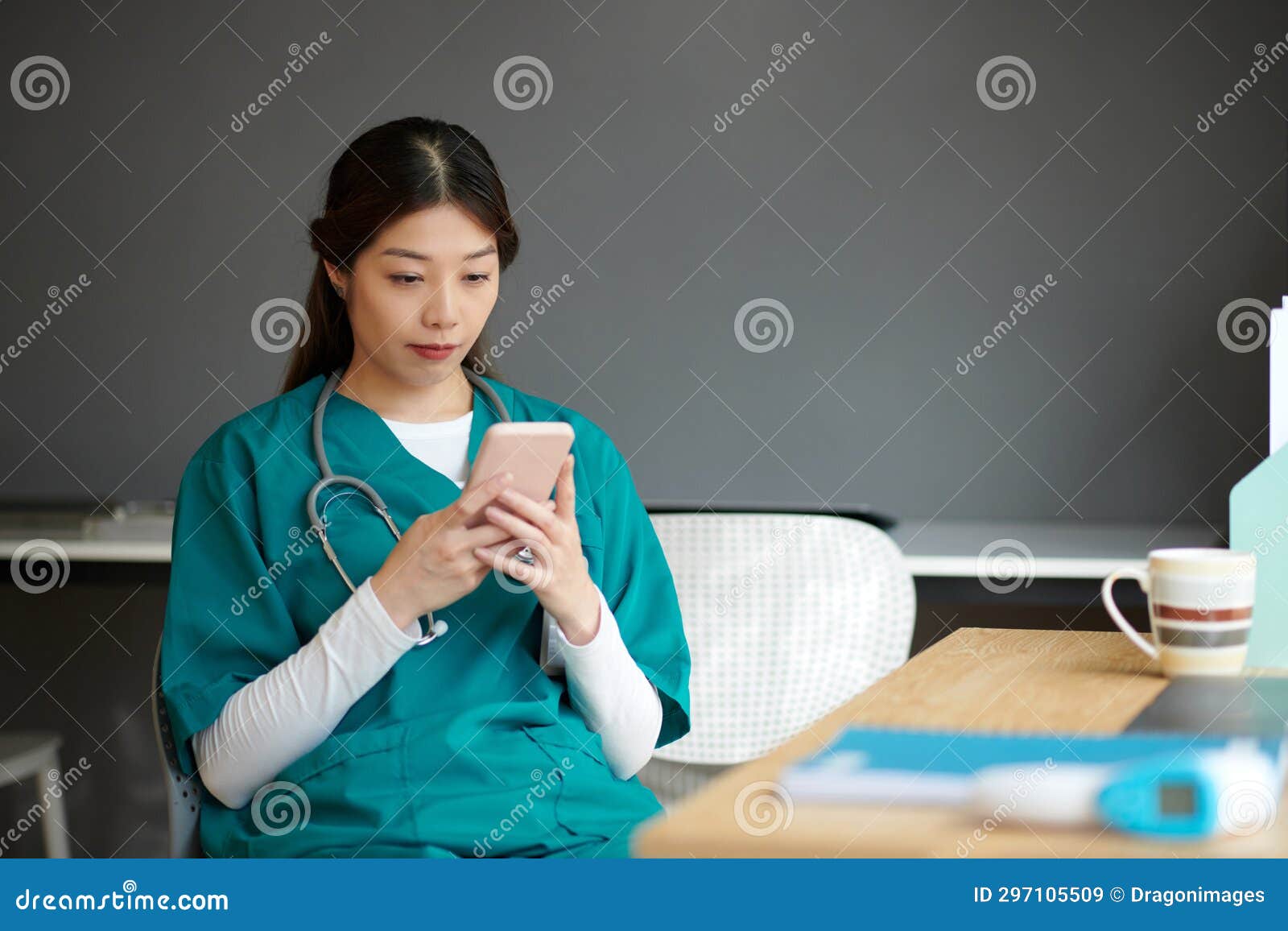Medical Nurse Checking Messages Stock Image - Image of young, asian ...