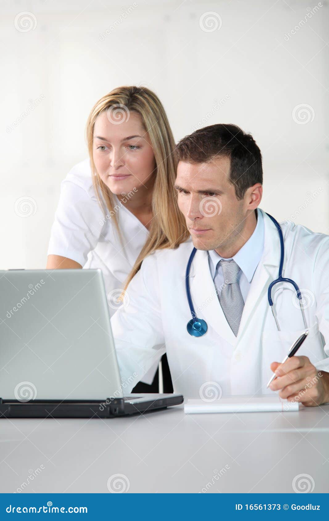 Medical People in Front of Laptop Computer Stock Image - Image of ...